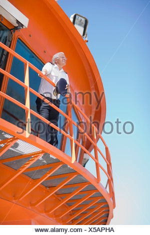 Ships Captain standing on the bridge wing, Mediterranean Sea, Malta ...