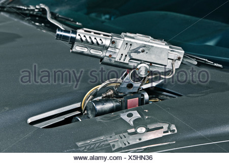 Machine gun on Aston Martin DB5, James Bond classic car Stock Photo - Alamy