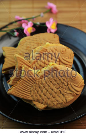 A taiyaki, a Japanese fish-shaped cake filled with red bean paste, from Snowy Village Dessert ...
