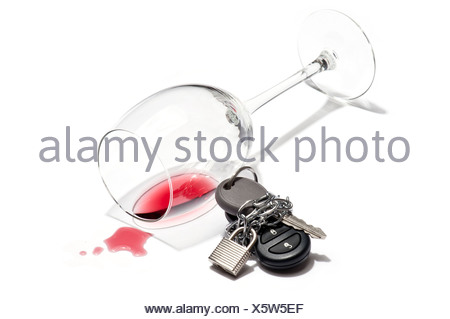 Knocked over glass of red wine Stock Photo - Alamy