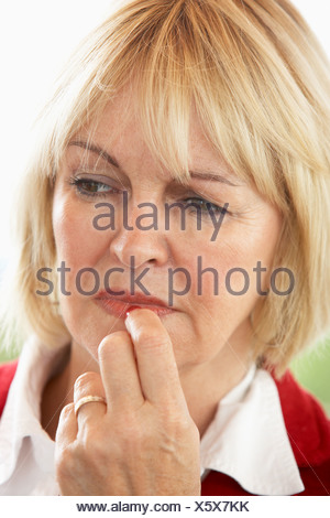Elderly woman frowning, portrait, close-up Stock Photo: 5432275 - Alamy
