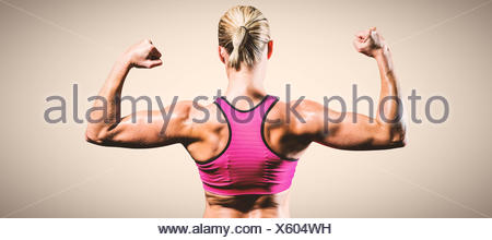 Strong muscular woman flexing his arms. Fit and healthy woman on Stock ...