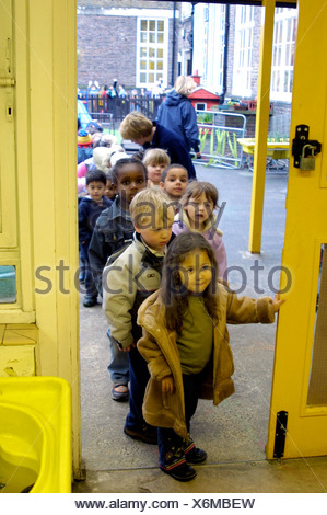 Nursery children arriving at school Stock Photo - Alamy