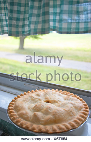 An apple pie cooling on a window sill Stock Photo - Alamy
