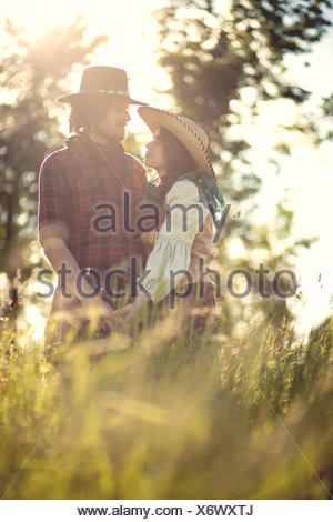 Cowboy and cowgirl holding hands Stock Photo: 28532192 - Alamy