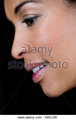 Side profile of a beautiful African woman face with Afro curly hair ...