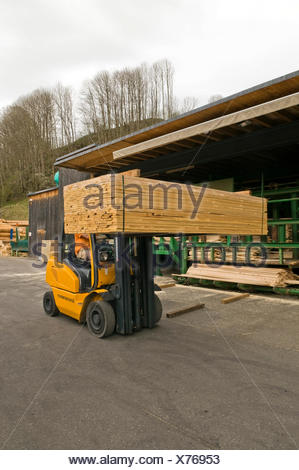 Forklift transporting high-quality lumber, sawmill, timber trade Stock ...