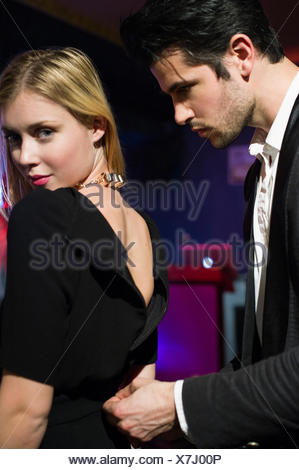 Man unzipping woman's dress Stock Photo: 88203705 - Alamy