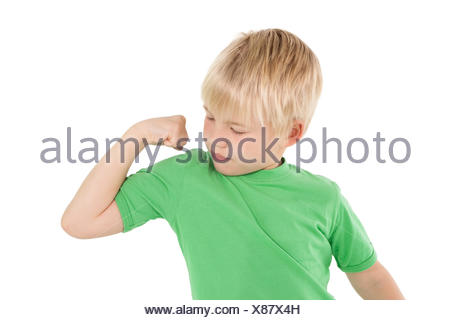 Cute boy flexing his arm Stock Photo: 80145622 - Alamy