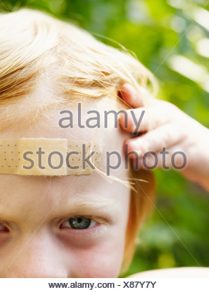 Boy, forehead, plaster, close up, person, child, injury, sore supply ...