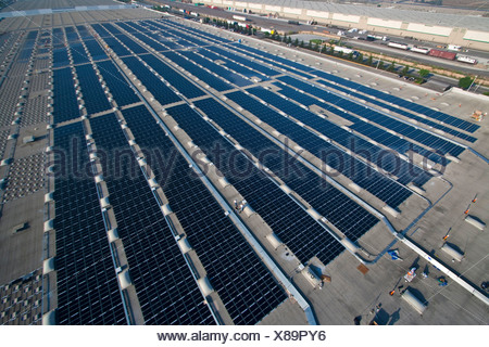 Solar panels on warehouse, aerial view, France, Europe Stock Photo ...