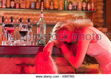girl sleeping at bar Stock Photo: 26609276 - Alamy