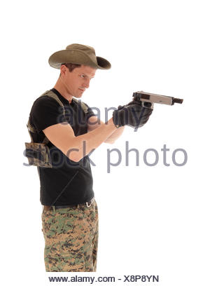Soldier pointing a pistol Stock Photo: 88646765 - Alamy