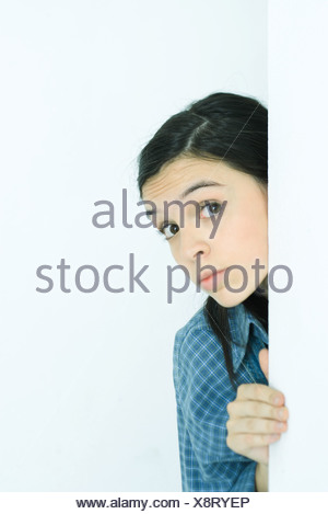 Teen girl looking surprised, holding up hands Stock Photo: 12871562 - Alamy