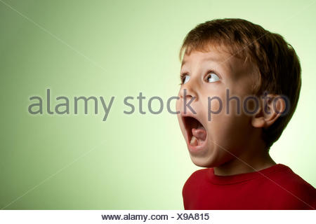 Little boy looking scared Stock Photo - Alamy