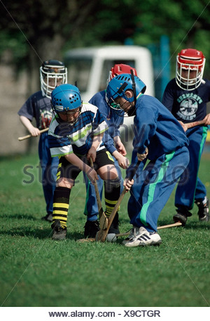 Children Playing Gaelic Sport Of Hurling, Ireland Stock Photo: 36371144 ...