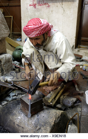 Blacksmith at work, Abu Dhabi, United Arab Emiarates Stock Photo ...