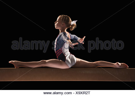 Girl on the splits in the sports ladder Stock Photo: 104300845 - Alamy