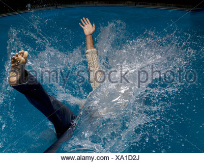 Man falling into water, slow motion Stock Photo - Alamy