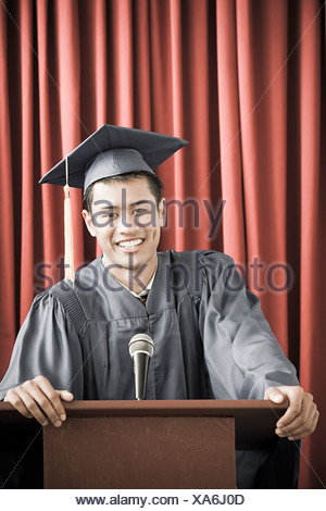 Student giving speech at a graduation ceremony at Jacobs University ...