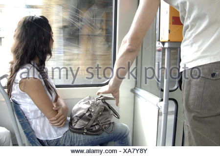 Hand pickpocketing, streetcar, thief, pickpocket, handbag, steal Stock ...