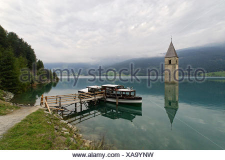 steeple of the church of Alt-Graun in Lake Reschen, Italy, South Stock ...