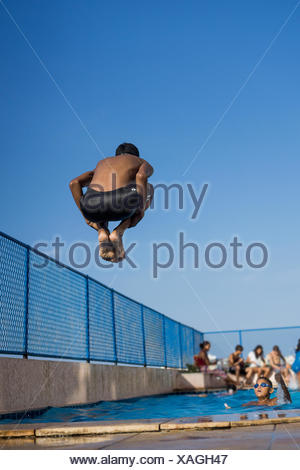 Child doing a cannonball Stock Photo: 19269550 - Alamy