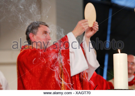 Catholic mass. Celebration of the Eucharist Stock Photo - Alamy