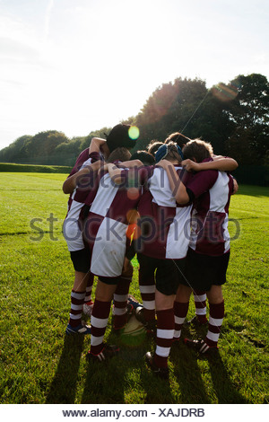 Teenage boys playing a game of rugby, physical education sport and ...