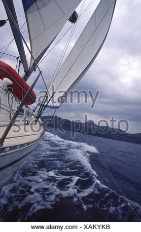 rough weather sailing sea boat lighthouse storm port fishing sail Stock ...