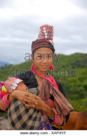 Young women of the Akha Pala tribe wearing traditional colourful Stock ...