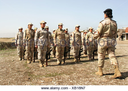 Peshmerga women fighters in camouflage during military exercise Stock ...