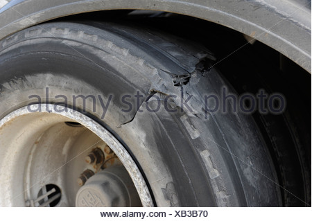 Burst tire of a truck after an accident, puncture Stock Photo: 48806558 ...