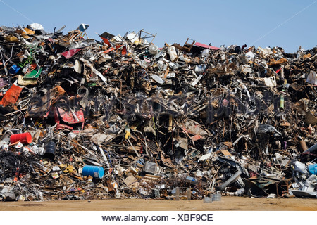 Pile of discarded household and industrial items at a scrap metal Stock ...