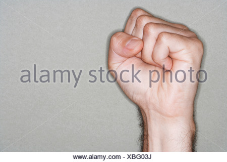 Man holding up clenched fist, close-up on hand Stock Photo: 26802858 ...