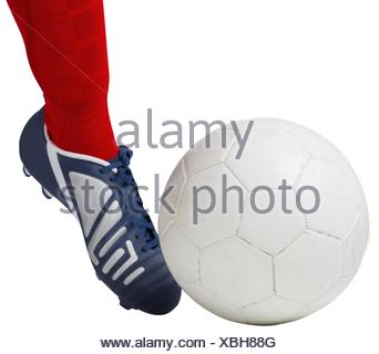 Football player kicking ball with boot Stock Photo: 69210985 - Alamy