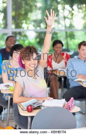 Student raising hand in class Stock Photo: 30161750 - Alamy