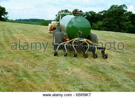 Agriculture - Chemical application, injecting liquid hog manure into ...