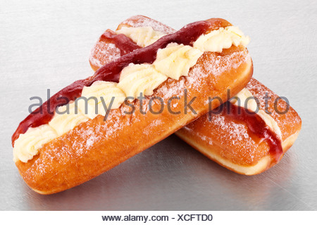 TWO FRESH CREAM AND JAM DOUGHNUTS Stock Photo: 13149021 - Alamy