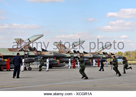 An Israeli pilot with a F-16 fighter jet in a hangar at Hatzor Israeli ...