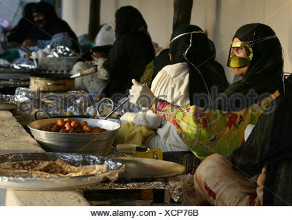 Woman cooking emirati food, Dubai, United Arab Emirates Stock Photo ...
