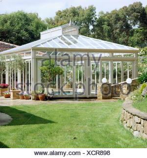 Large glass conservatory housing indoor swimming pool Stock Photo - Alamy