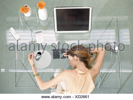 Office worker slumped on his desk Stock Photo: 4822112 - Alamy