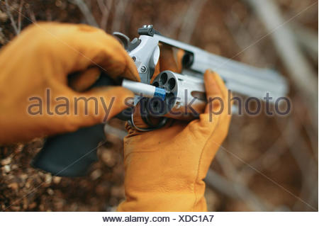 Man Loading Magnum Revolver Gun closeup Stock Photo - Alamy