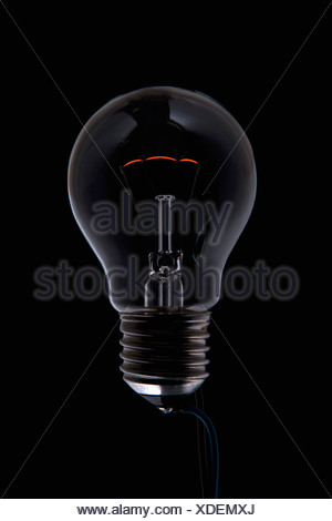 An unlit light bulb in the dark Stock Photo: 47718713 - Alamy