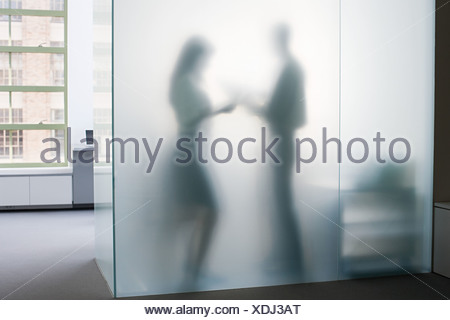 Person behind a frosted window Stock Photo: 10498418 - Alamy