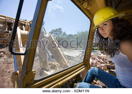 Woman operating bulldozer at a construction site Stock Photo: 16168278 ...