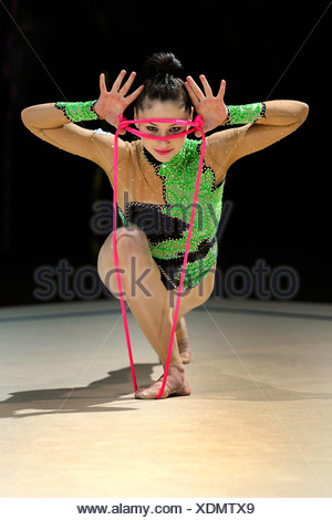 woman doing rhythmic gymnastics with rope Stock Photo: 48861533 - Alamy