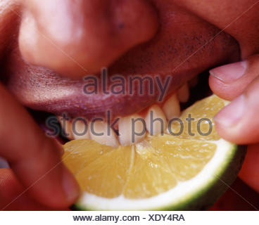 Man, lime slice, bite, close up, fruit, citrus fruit, tropical fruit ...