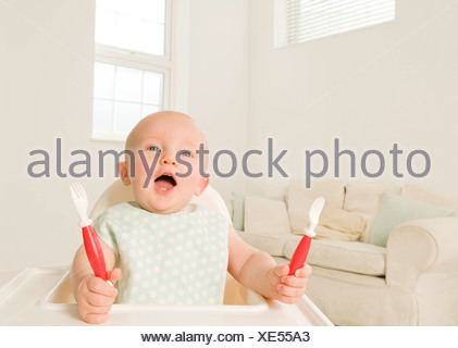 A portrait of a baby demanding food Stock Photo - Alamy